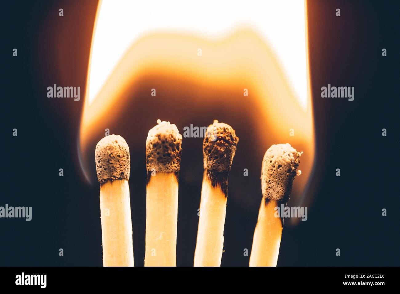 Bundles of burning matches in front of black Background, Close-up Stock ...