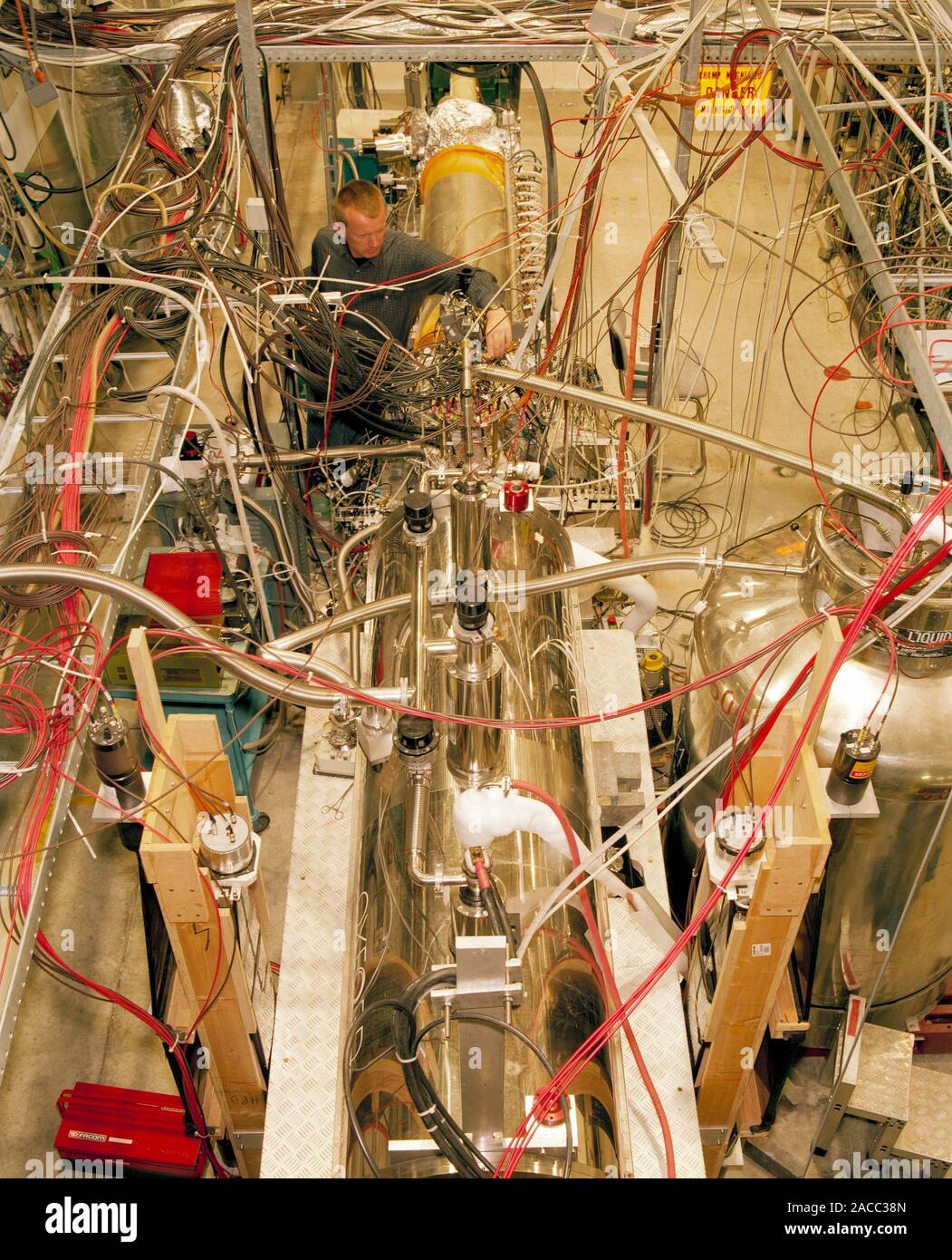 ATHENA antimatter laboratory. Technician working on the ATHENA ...