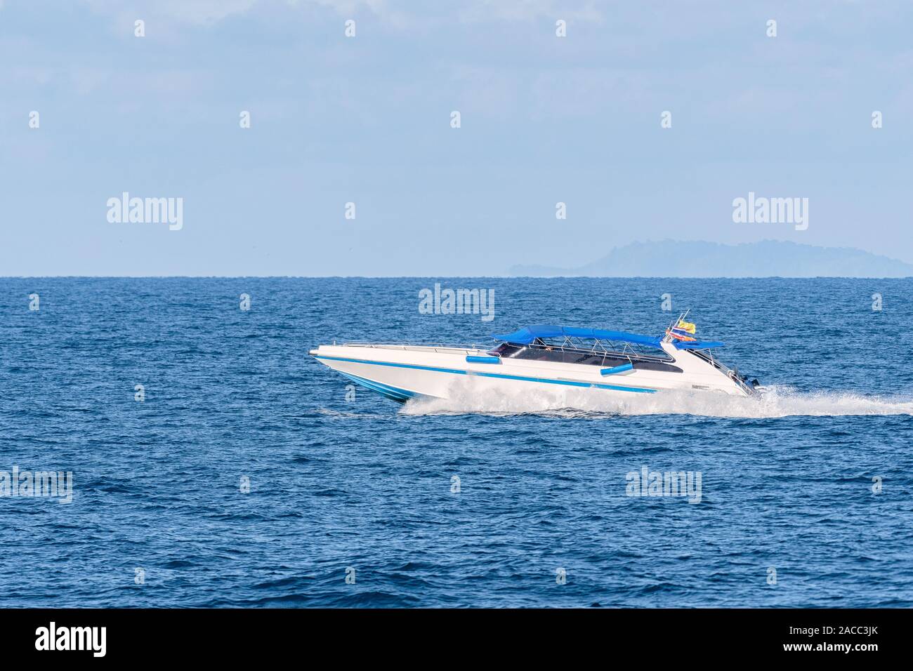 Speed boat on azure sea in turquoise blue water Stock Photo - Alamy