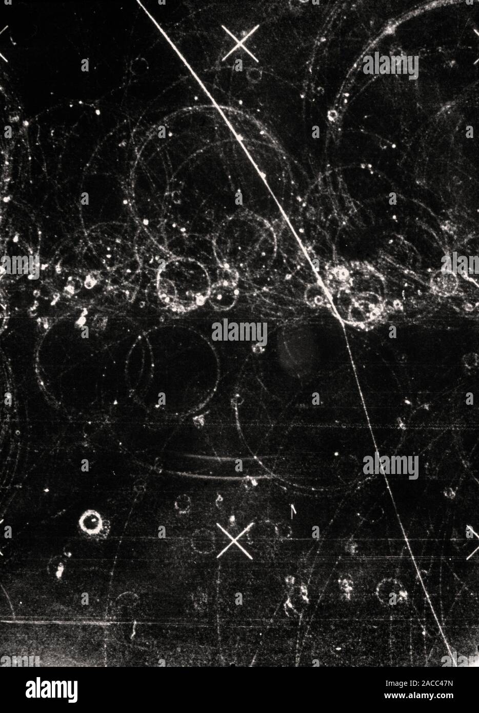 CLoud chamber photograph showing production of a proton & a tritium ...