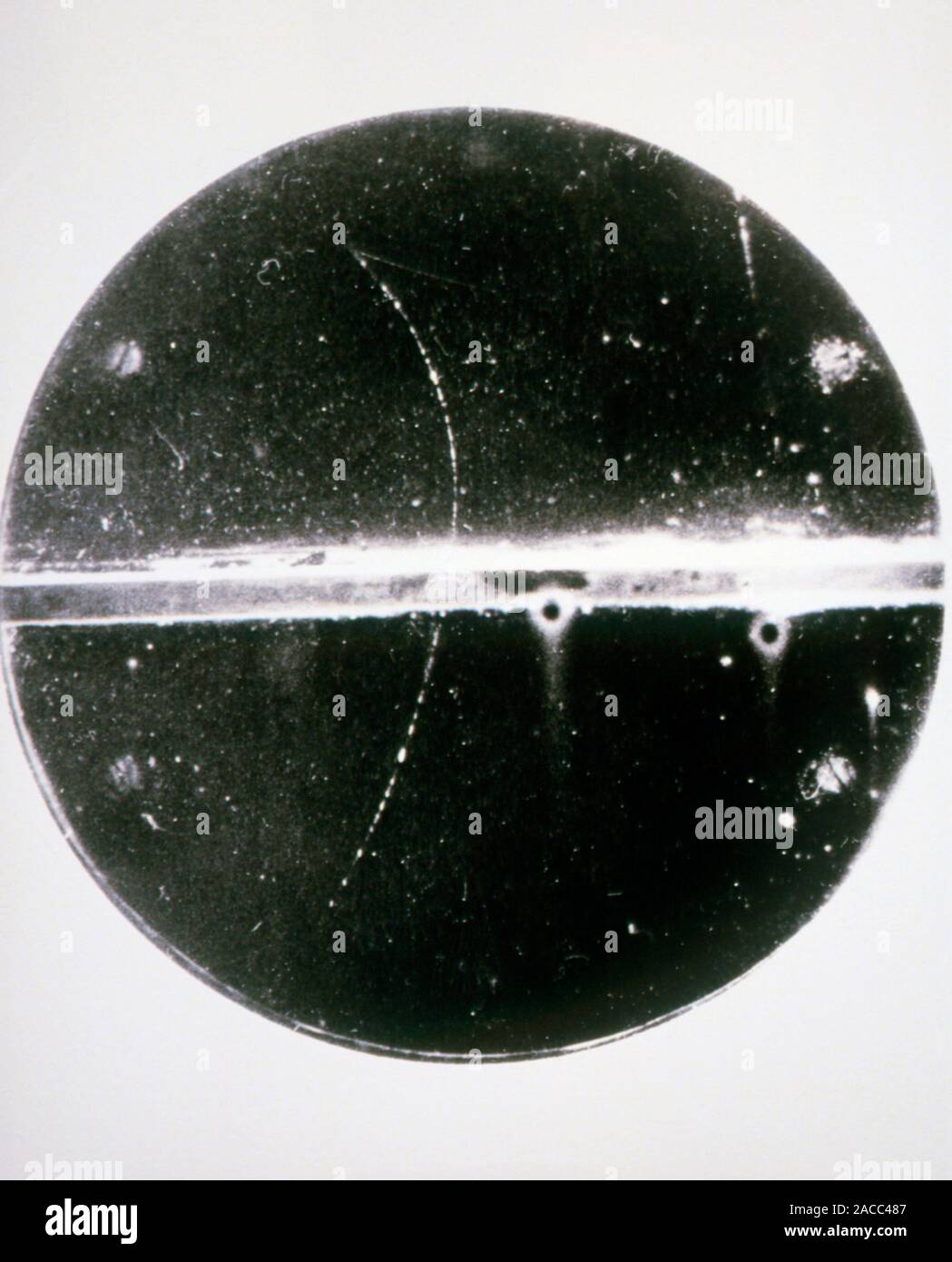 The discovery photograph of the positron, the positive version of the ...