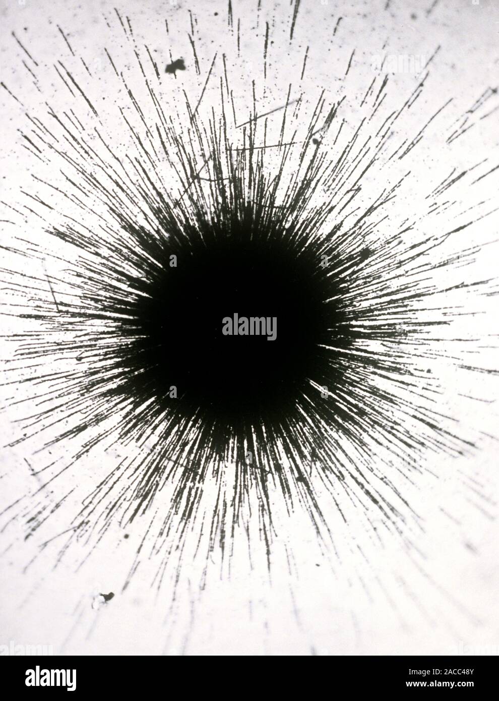 The radioactive emission of alpha particles from radium is dramatically ...