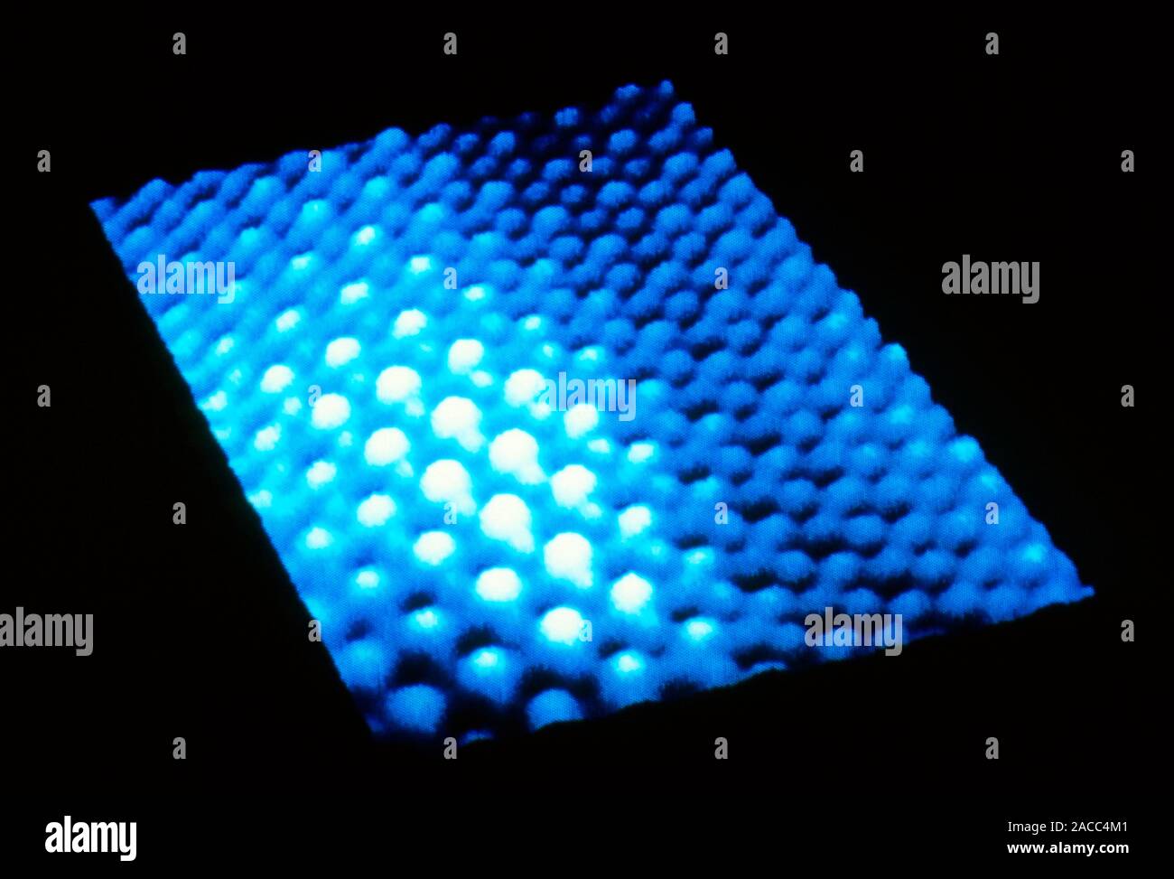Scanning tunnelling micrograph of palladium atoms on a graphite ...