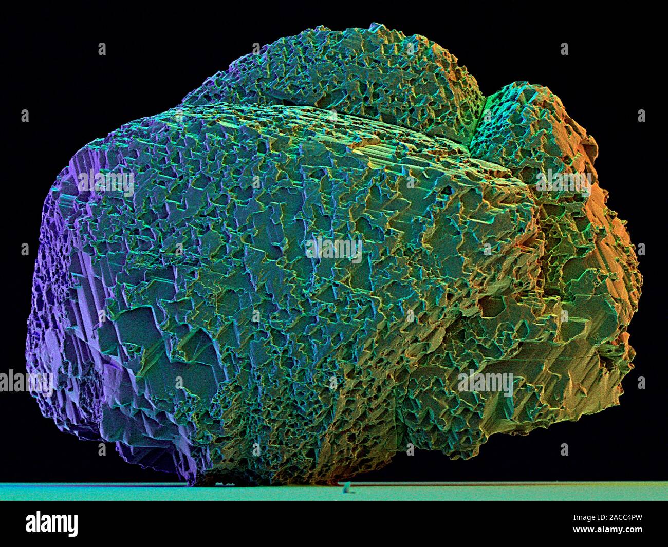 Microdiamond. Coloured scanning electron microg- raph (SEM) of an ...