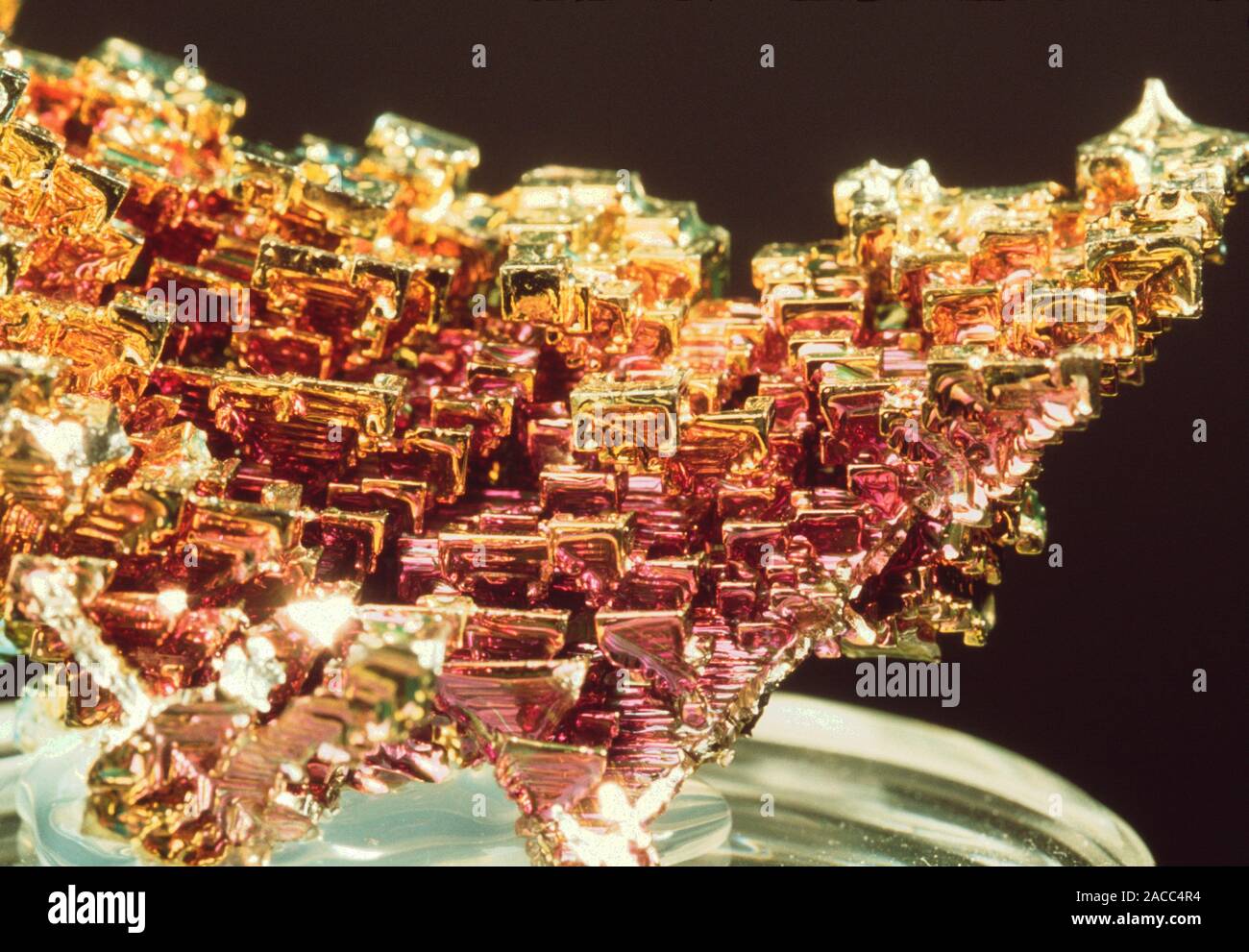 Bismuth. Crystals of the heavy metal element bismuth (chemical symbol ...