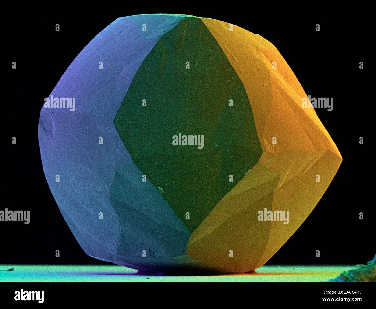 Microdiamond. Coloured scanning electron micrograph (SEM) of a ...
