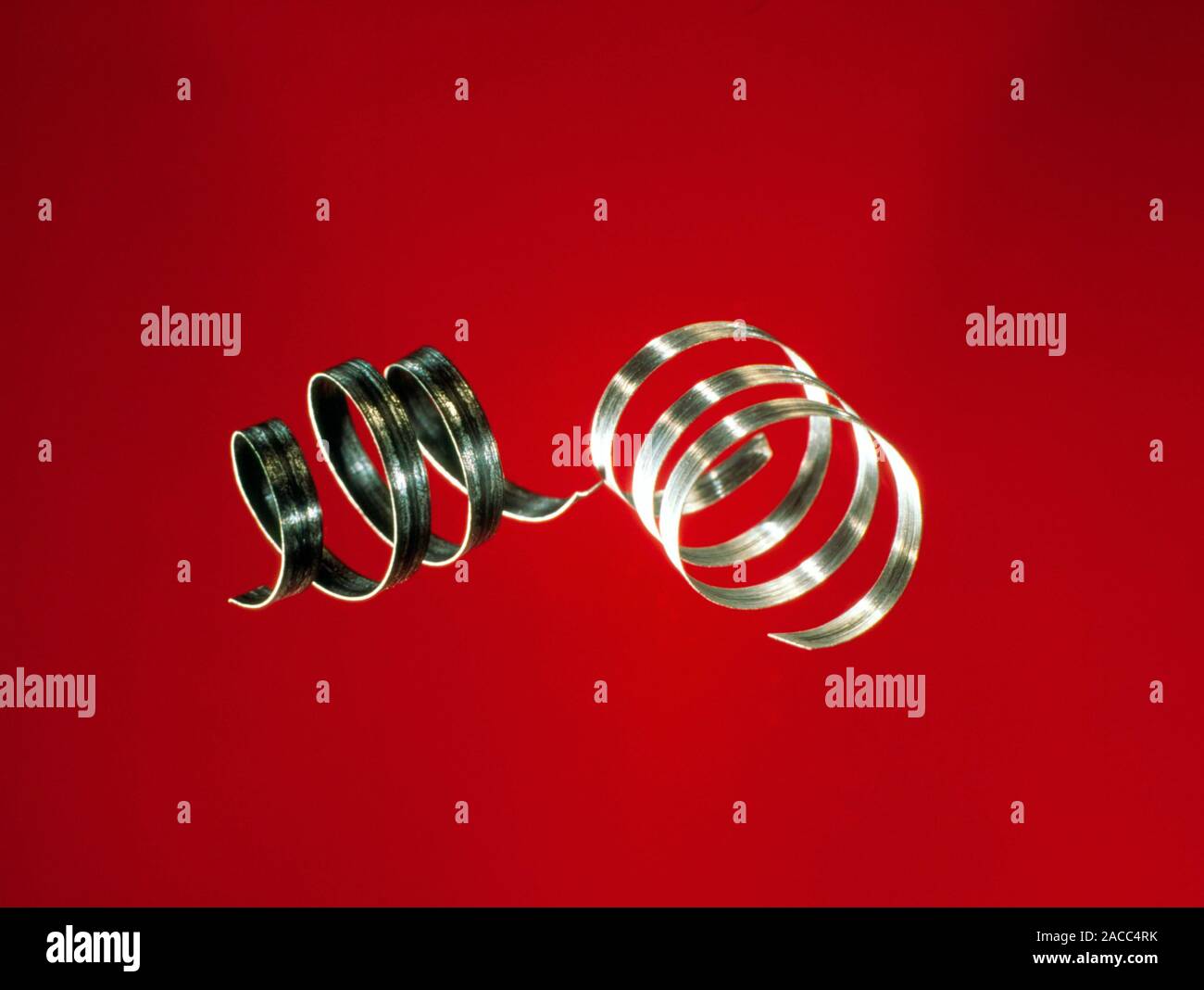 Magnesium. Strips of the reactive metallic element magnesium (Mg). The ...