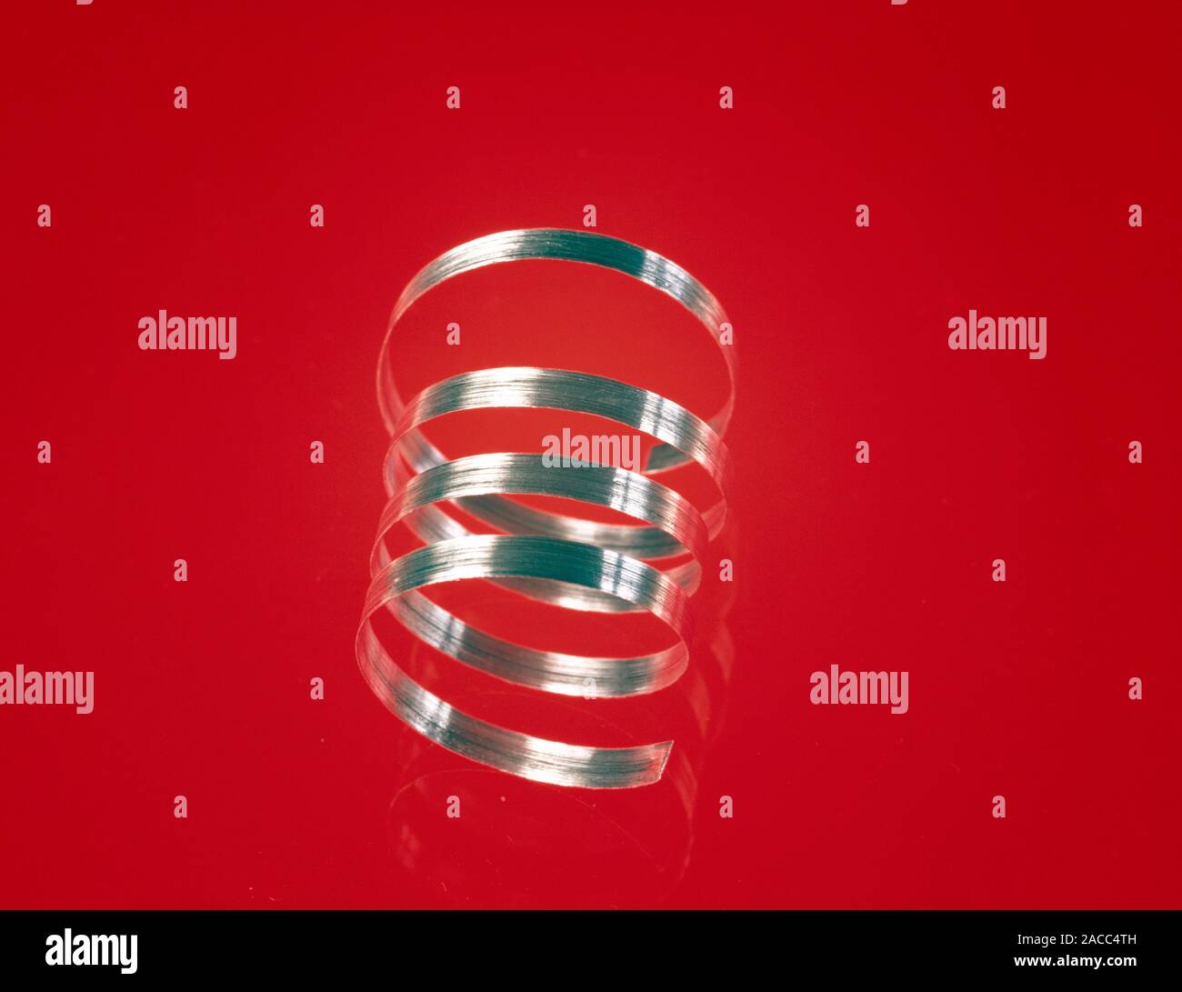 Magnesium ribbon. Magnesium, with a chemical symbol of Mg, is a silvery ...