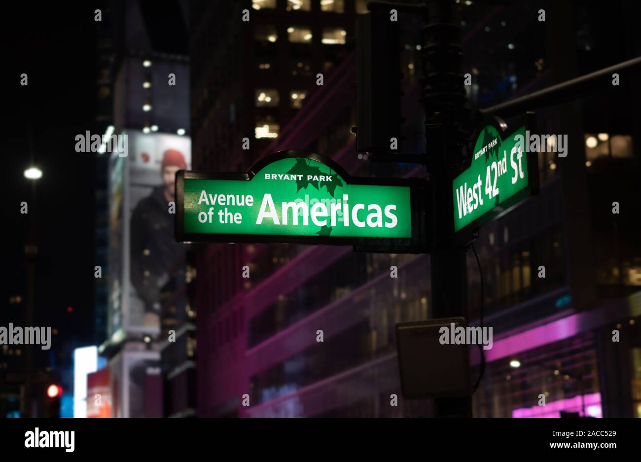 Avenue of the Americas and 42nd st. corner street sign in Bryant Park ...
