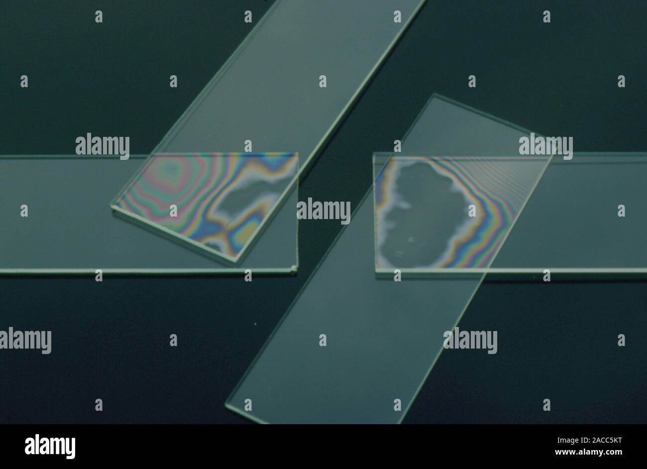 Newton's rings, circular interference patterns formed between two microscope slides Stock Photo ...