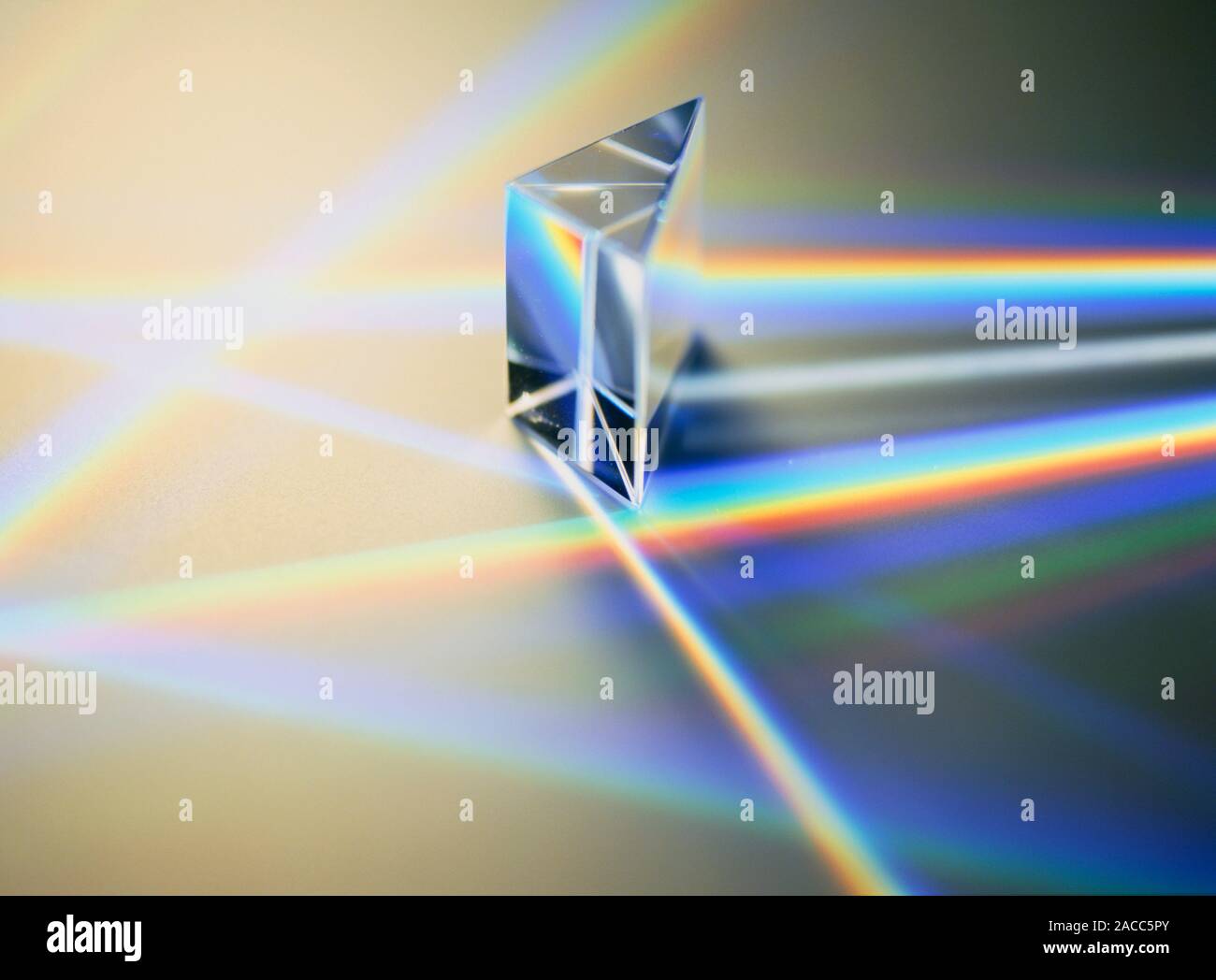 Refraction. White light being refracted as it passes through a ...