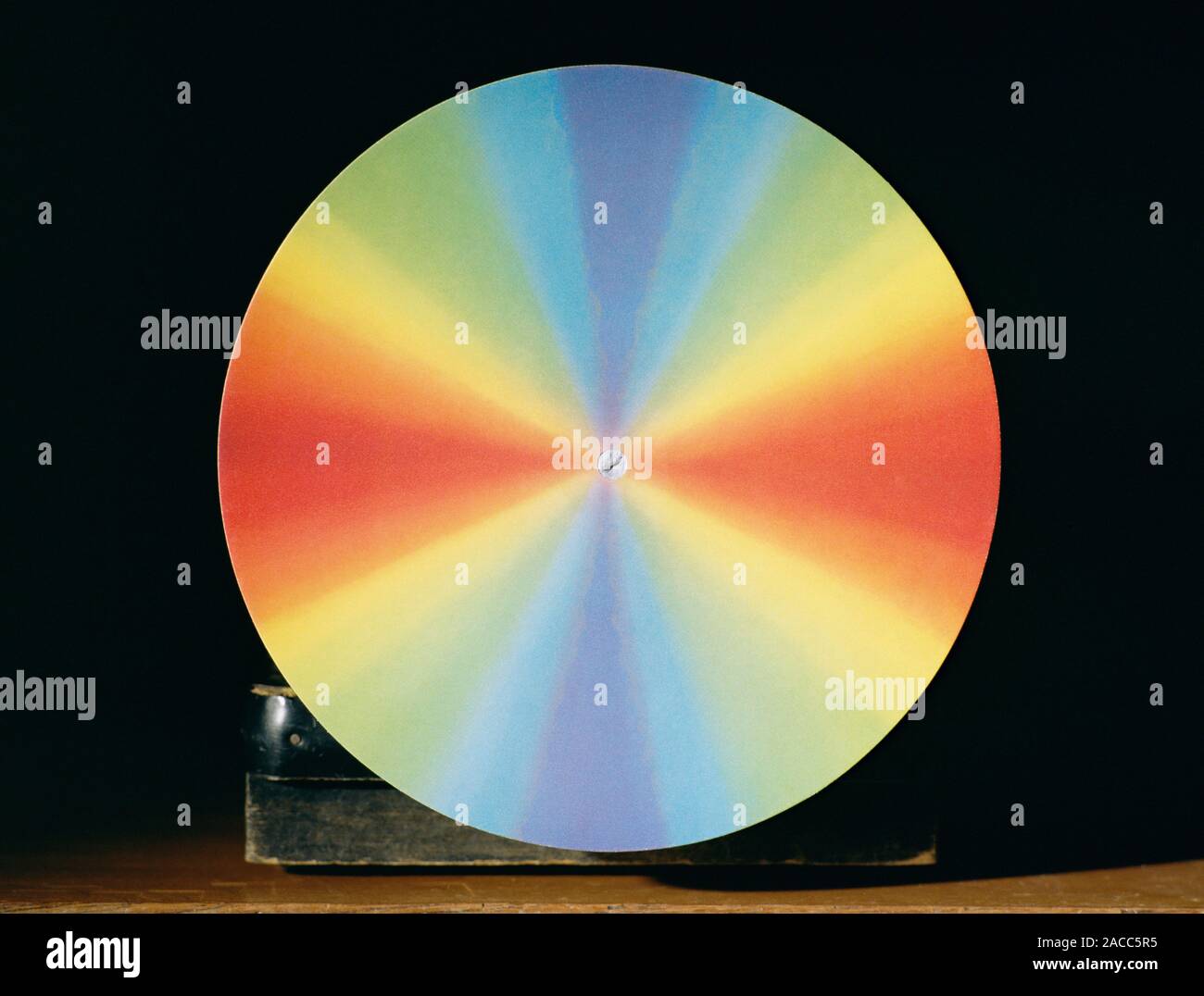 Newton's colour disc. Image 1 of 2. This piece of apparatus is used to ...