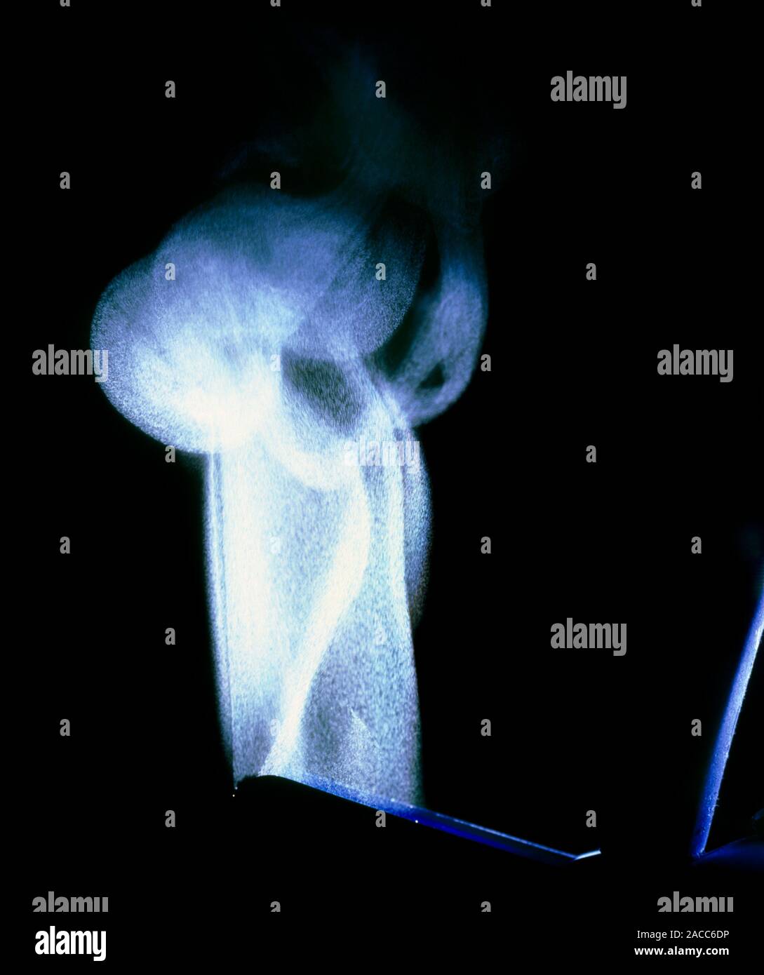 Evaporation of water. Steam rises from the mouth of a kettle during the ...