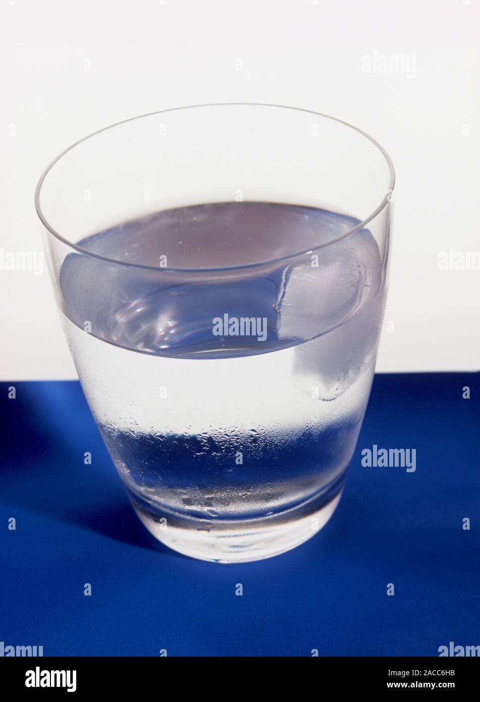 Water condensation on a glass of cold water. When warm water vapour ...