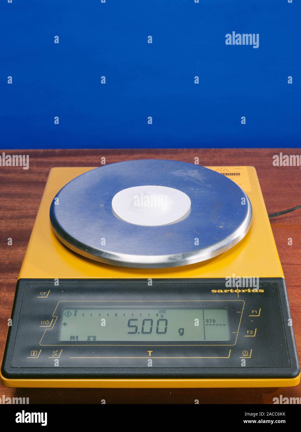 Salt on scales, image 2 of 3. The scales, also known as a top pan ...