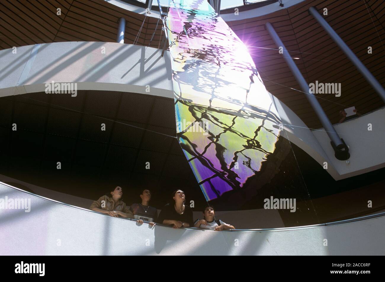 Giant soap film. People watching a giant soap film. The film is ...