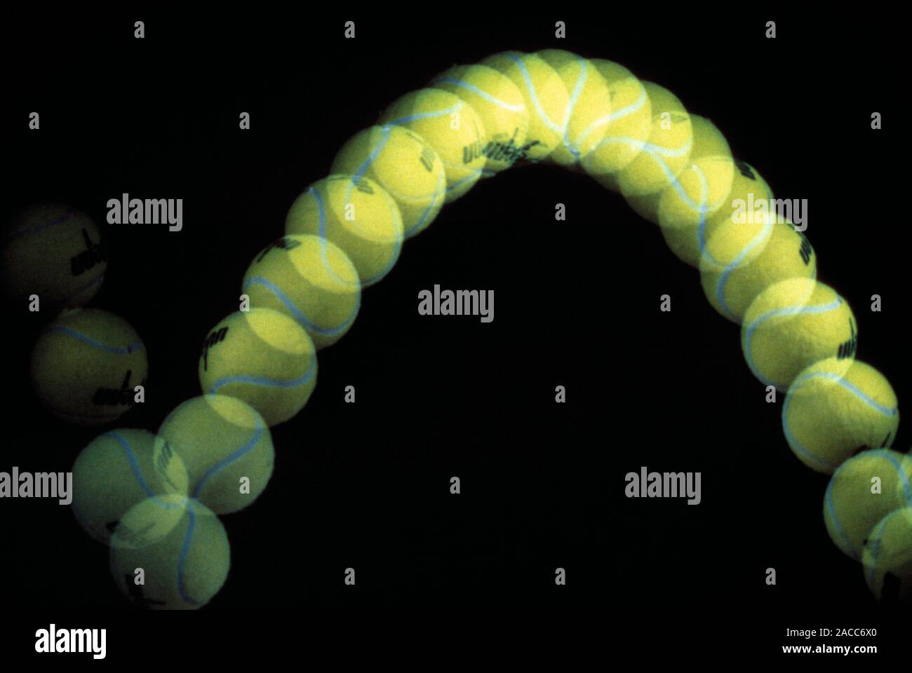 Bouncing ball. Stroboscopic photograph of a bouncing tennis ball. The ...