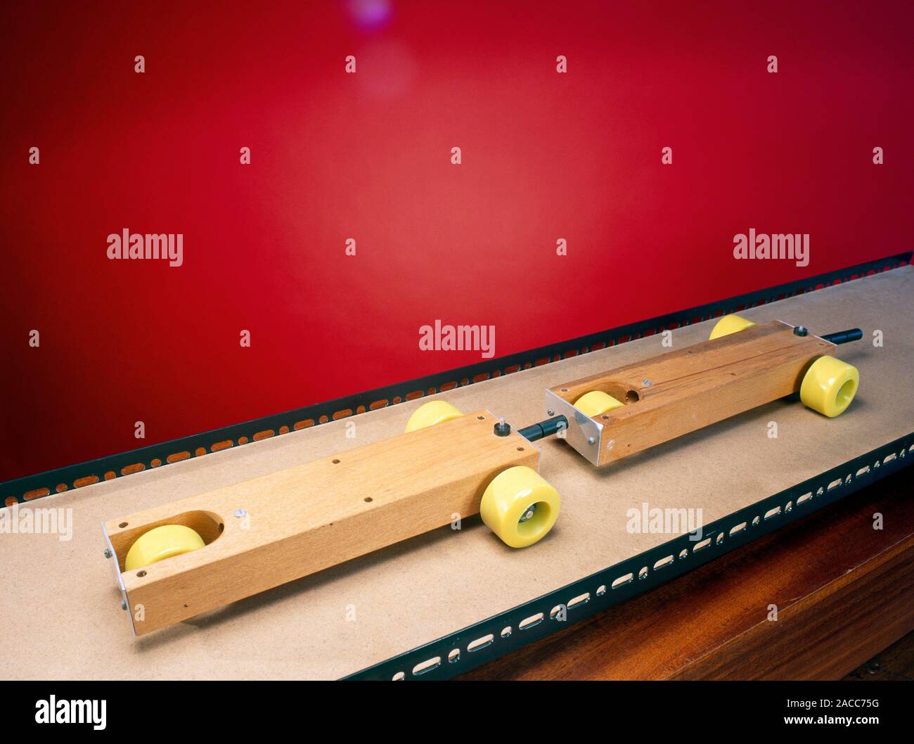 Collision experiment demonstrating linear motion Stock Photo - Alamy