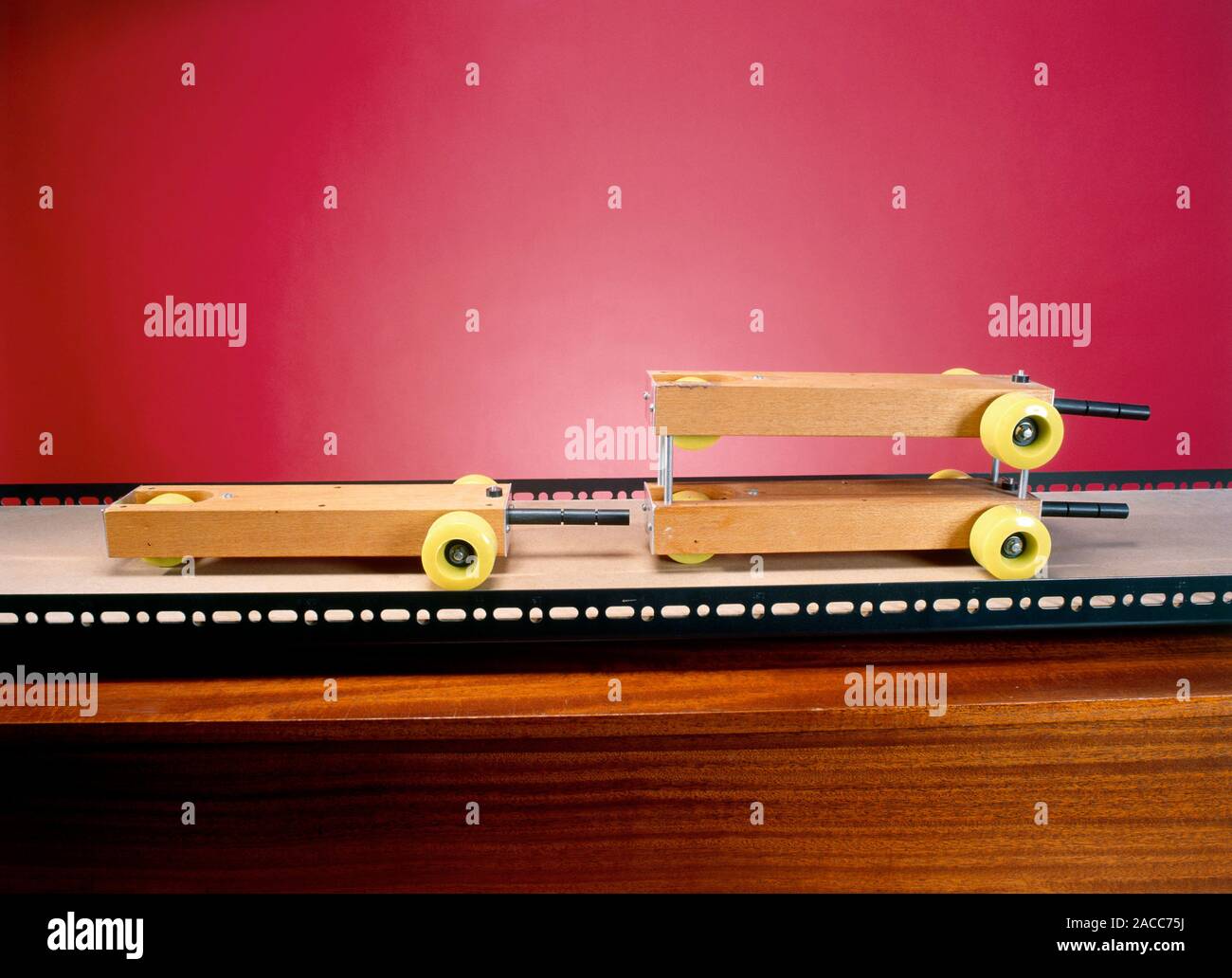 Collision experiment demonstrating linear motion Stock Photo - Alamy