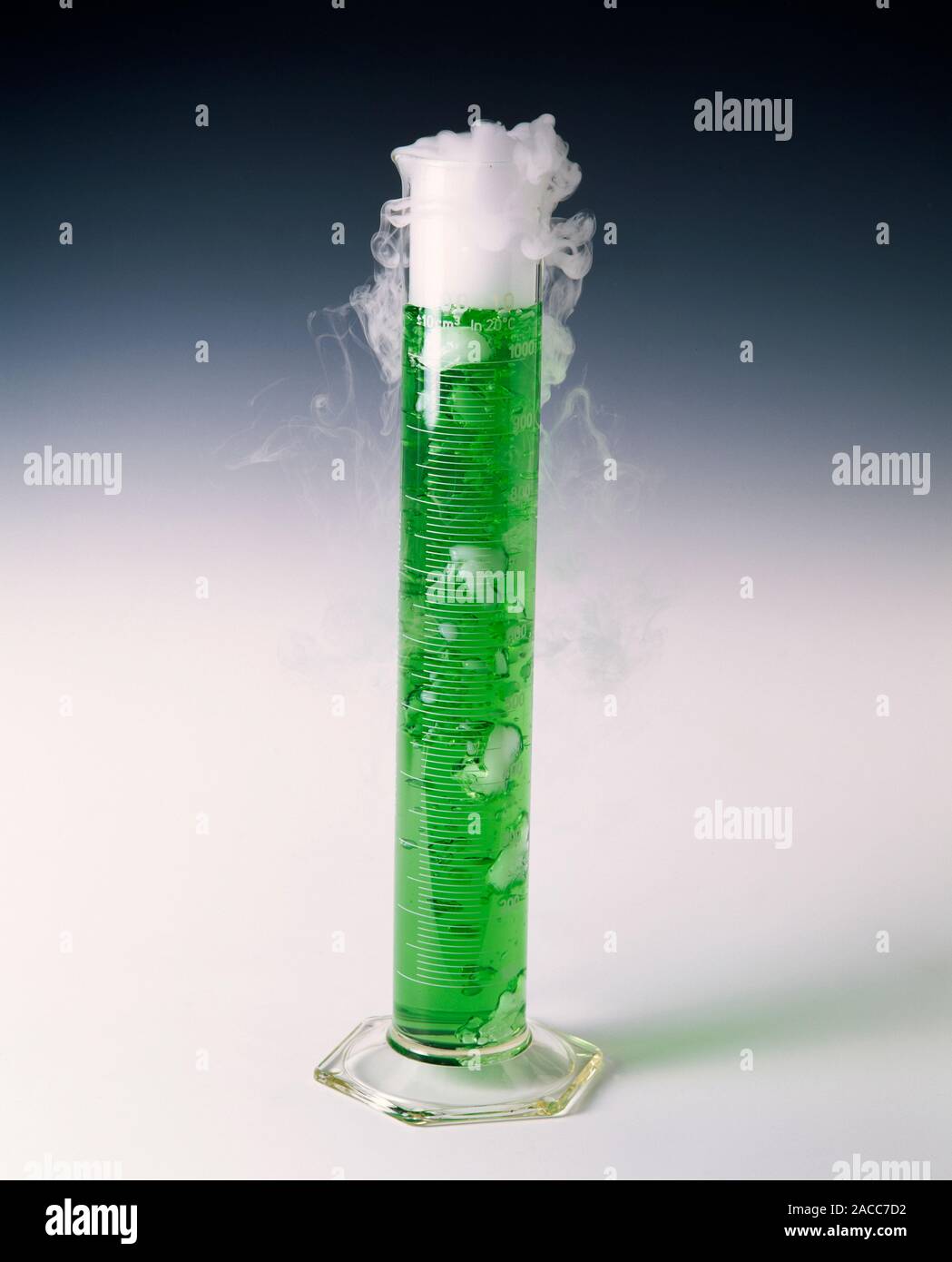Carbon dioxide gas boiling through a solution of an acid-base indicator ...