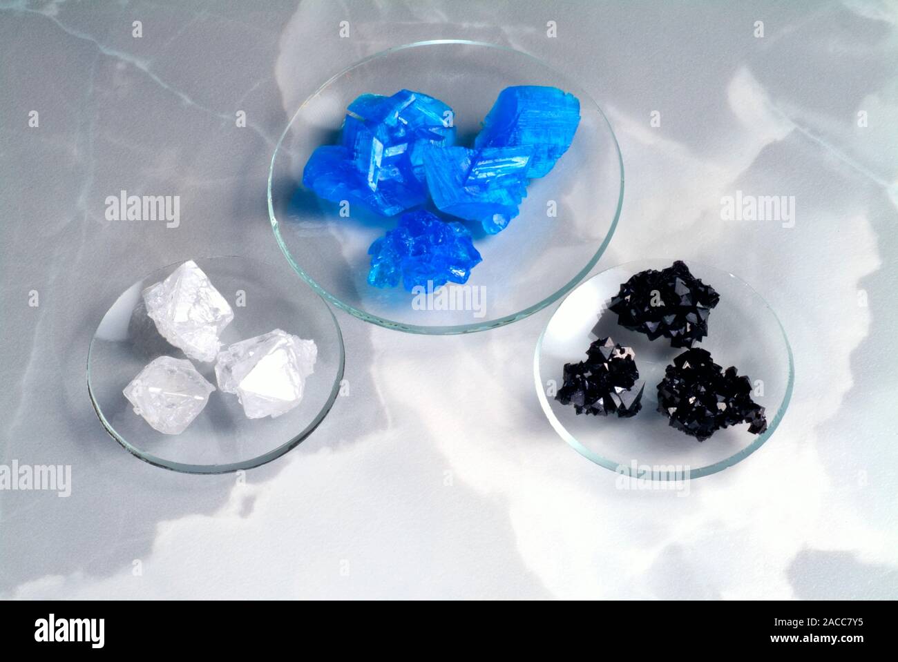 Copper sulphate and alum crystals. Copper (II) sulphate (blue, CuSO4 ...