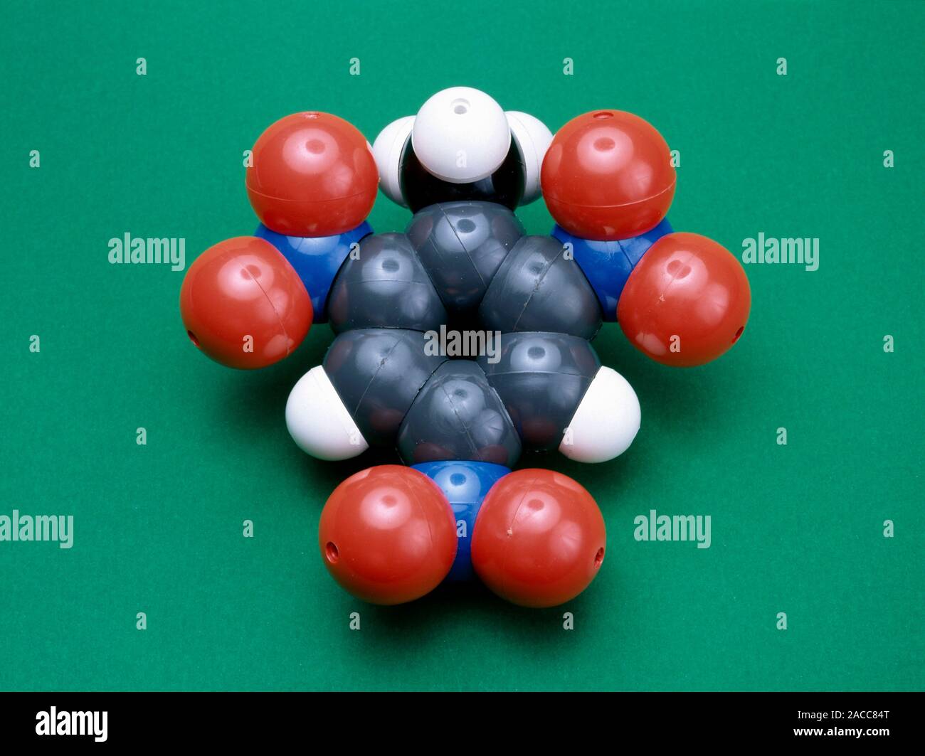 TNT molecule. Molecular model of trinitrotoluene (TNT, formula C7H5N3O6 ...