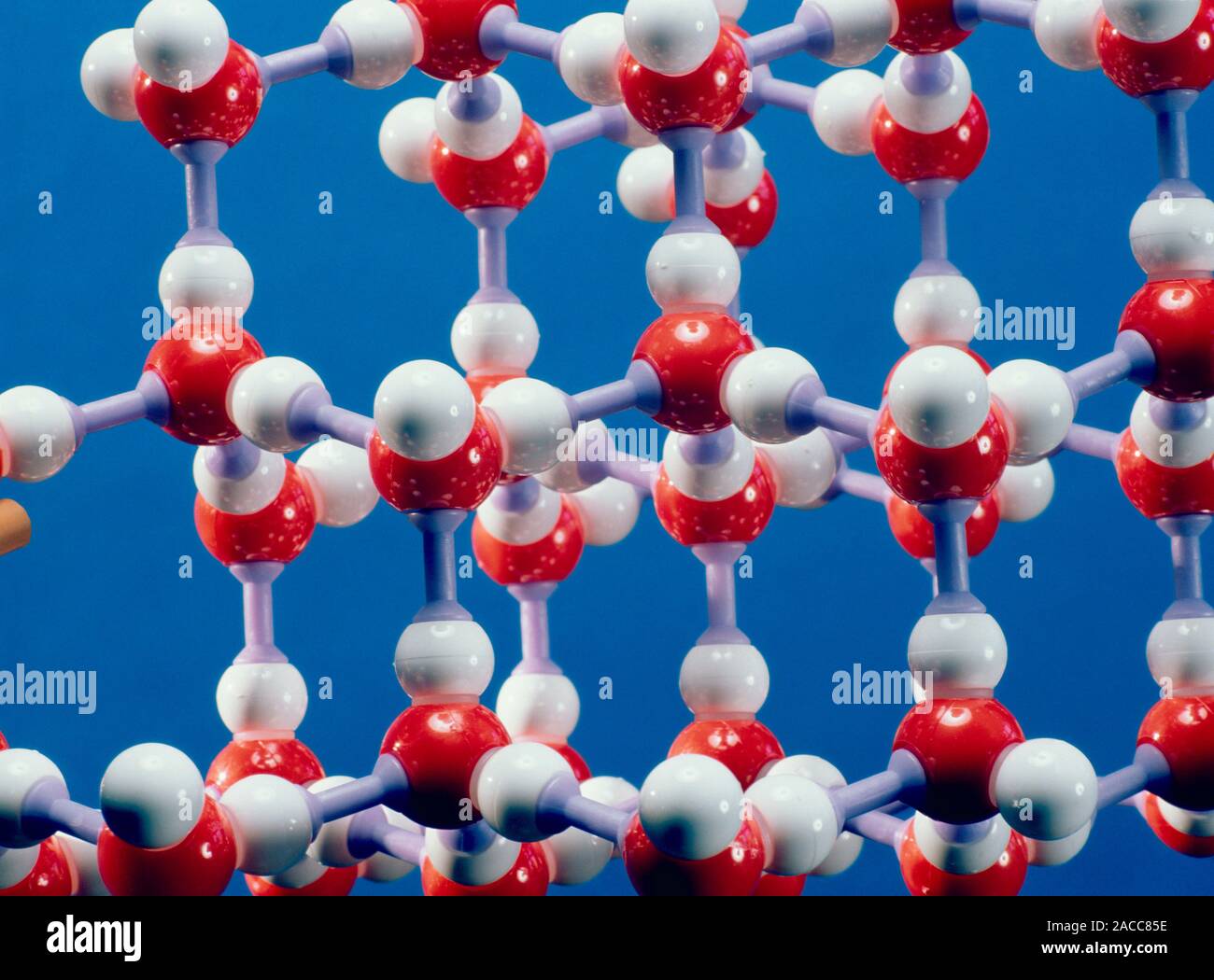 Ice. Molecular model of ice, the solid form of water. Each water ...