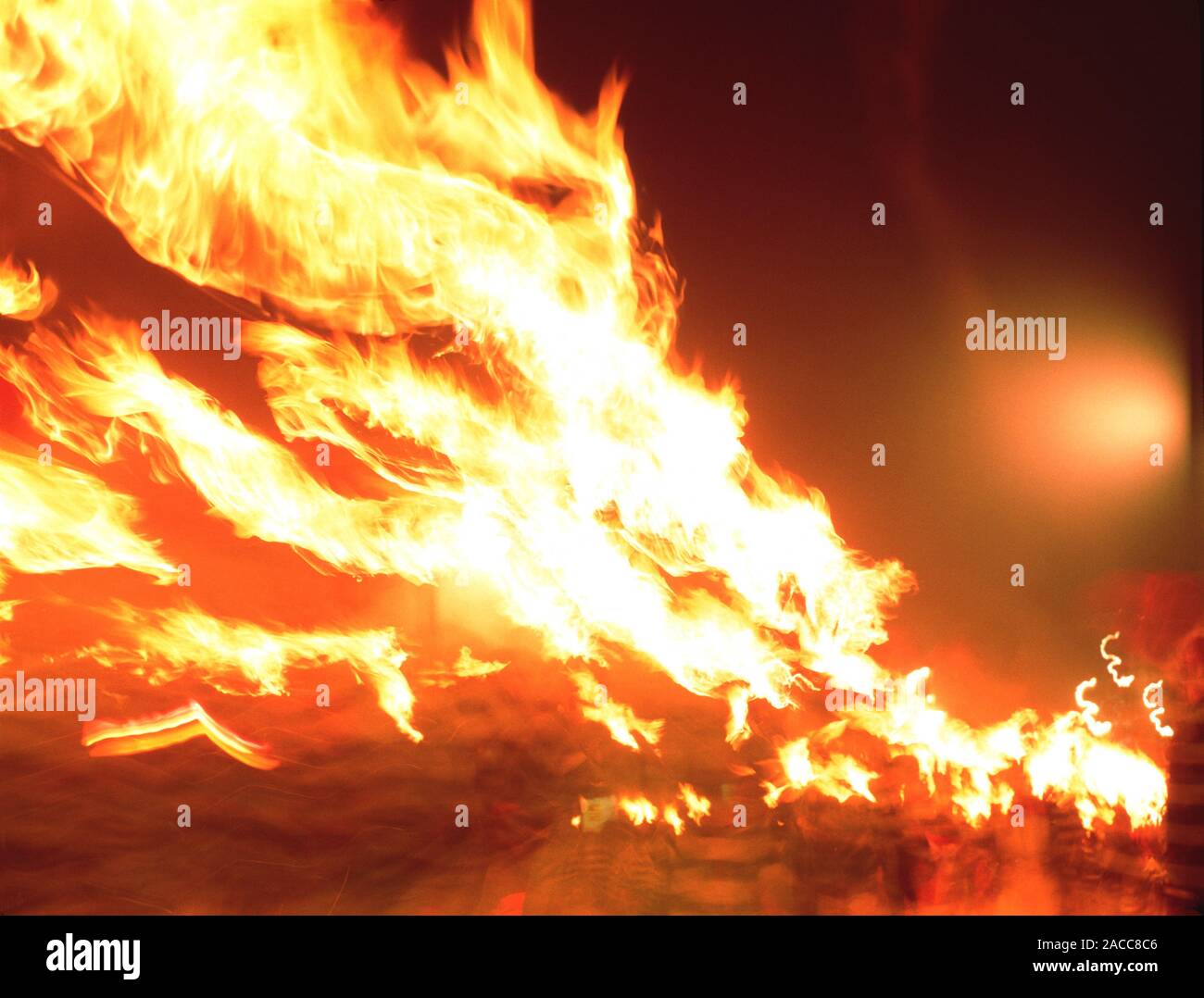 Torch flames. Time exposure image of flames from burning torches ...
