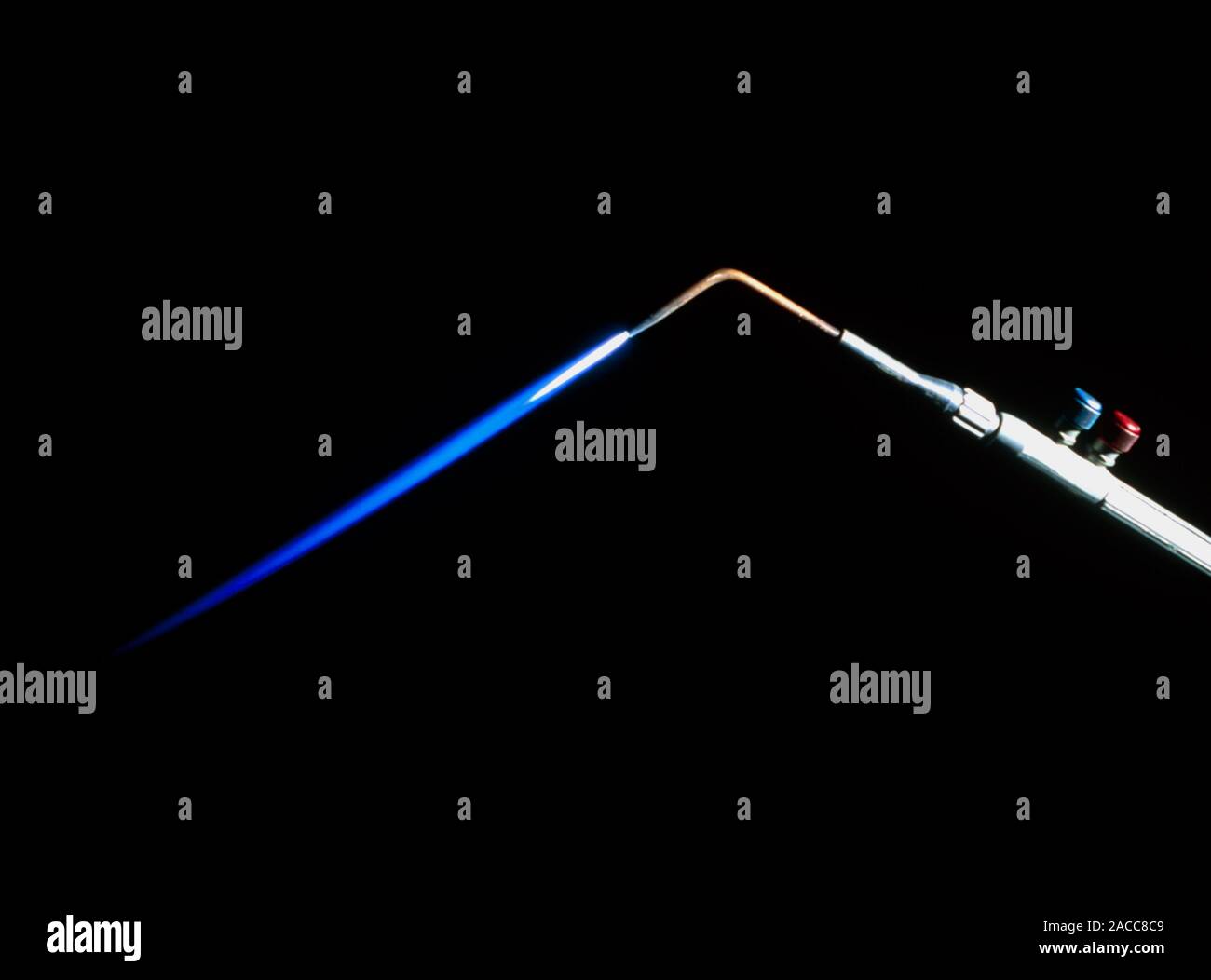 Oxyacetylene flame (blue) from an oxyacetylene torch or burner. This ...