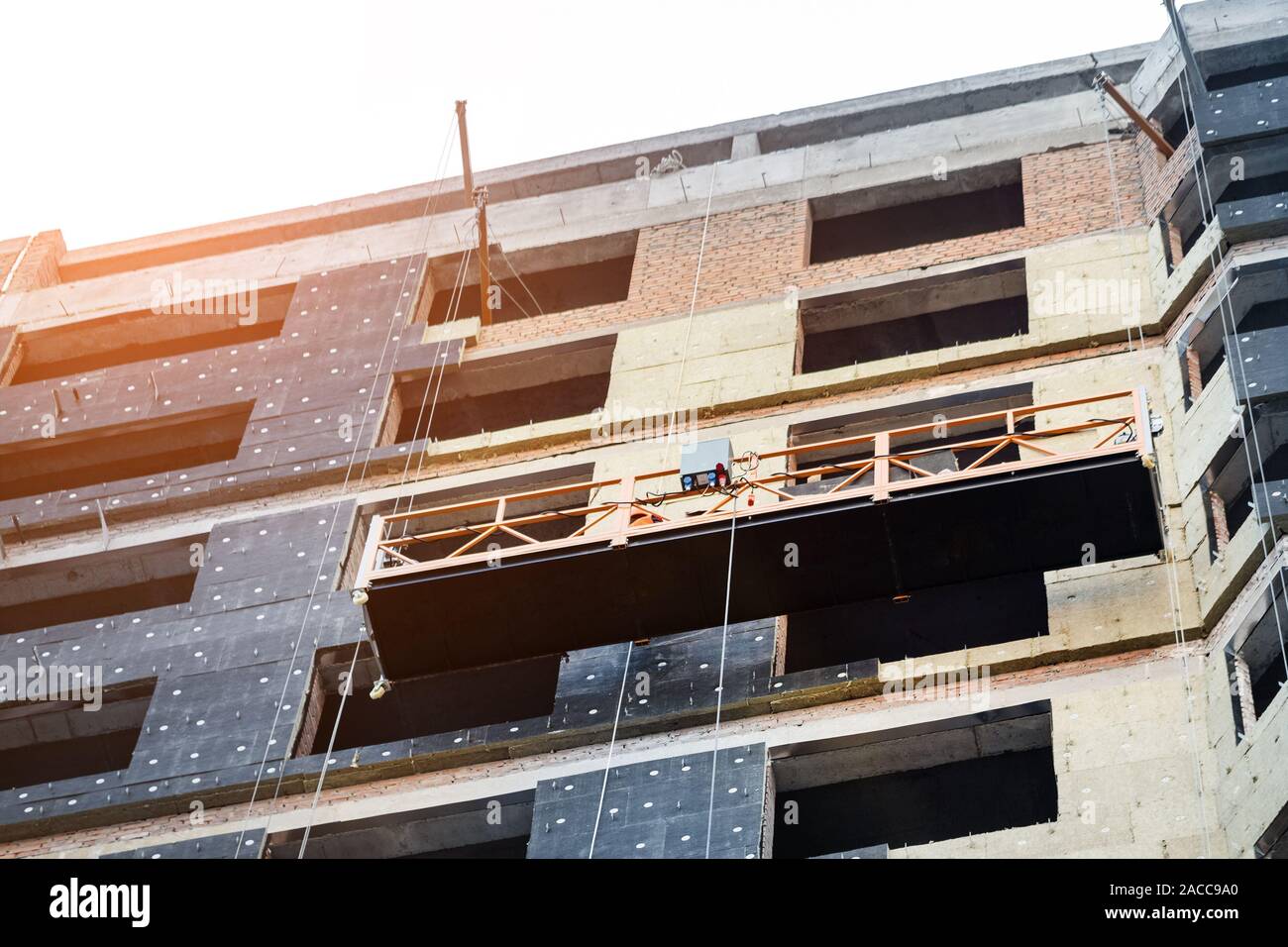 Suspended construction cradle hi-res stock photography and images - Alamy