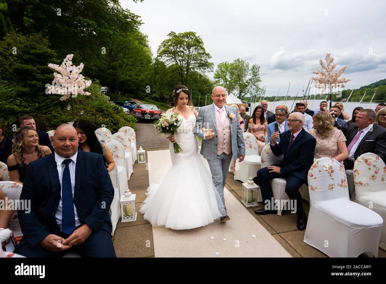 An outdoor English traditional wedding at Rudyard lake sailing club ...