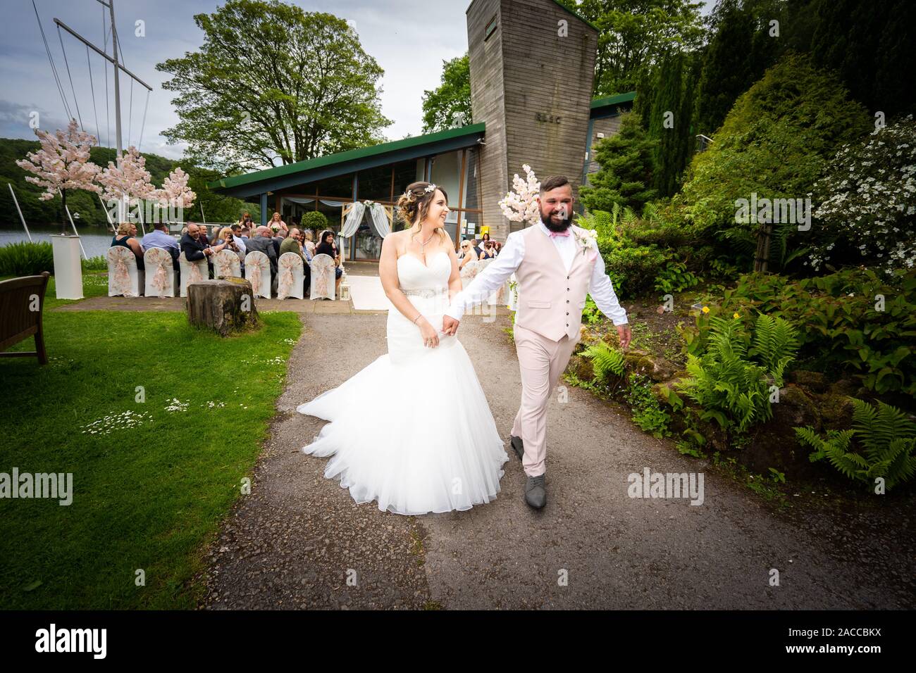 An outdoor English traditional wedding at Rudyard lake sailing club ...
