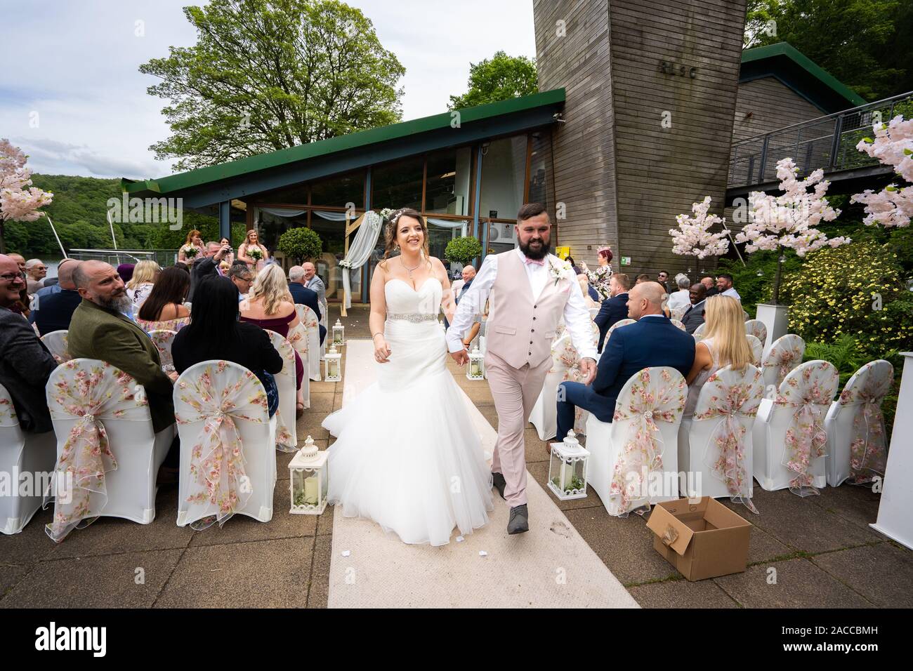 An outdoor English traditional wedding at Rudyard lake sailing club ...