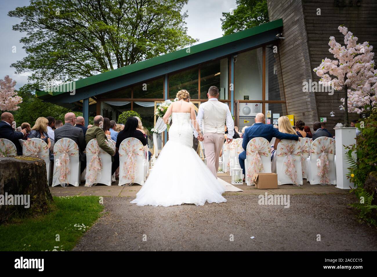 An outdoor English traditional wedding at Rudyard lake sailing club ...