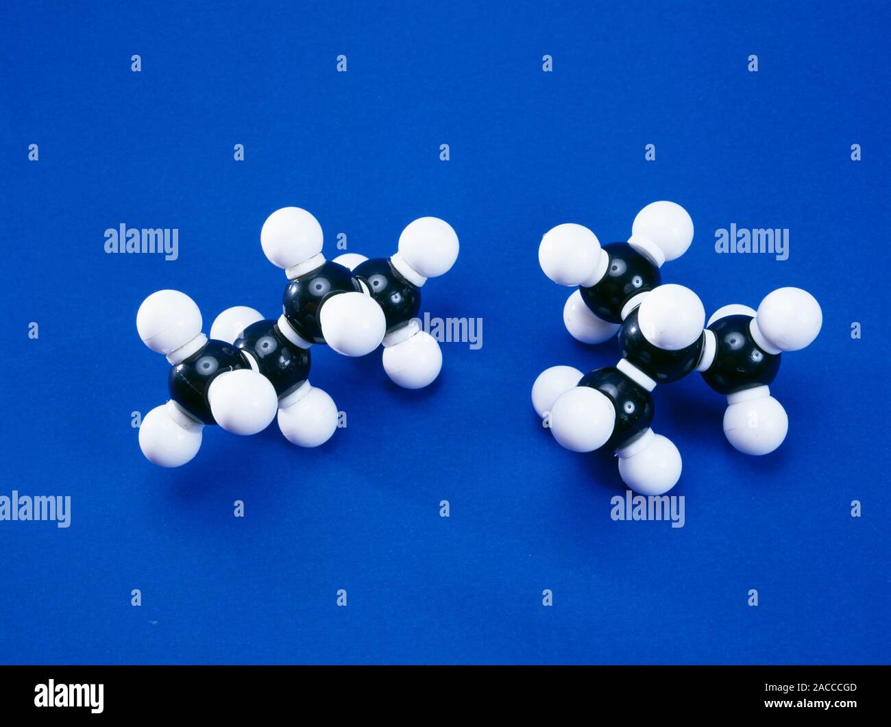 Isomers of butane. Molecular model of two isomers of butane (C4.H10 ...