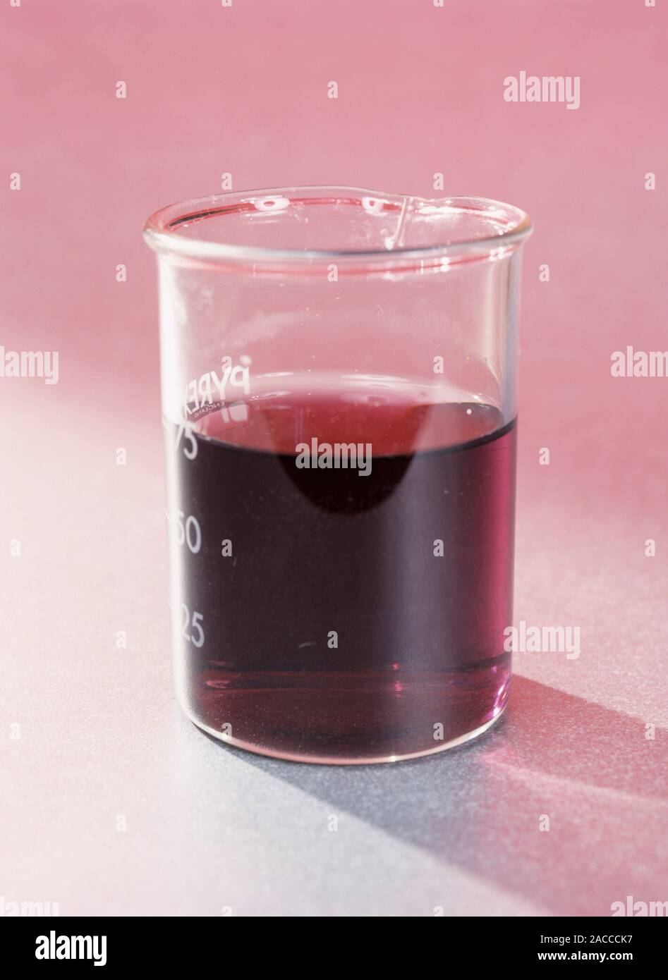 Chromium potassium sulphate (K2Cr2(SO4)4) solution in a beaker Stock ...