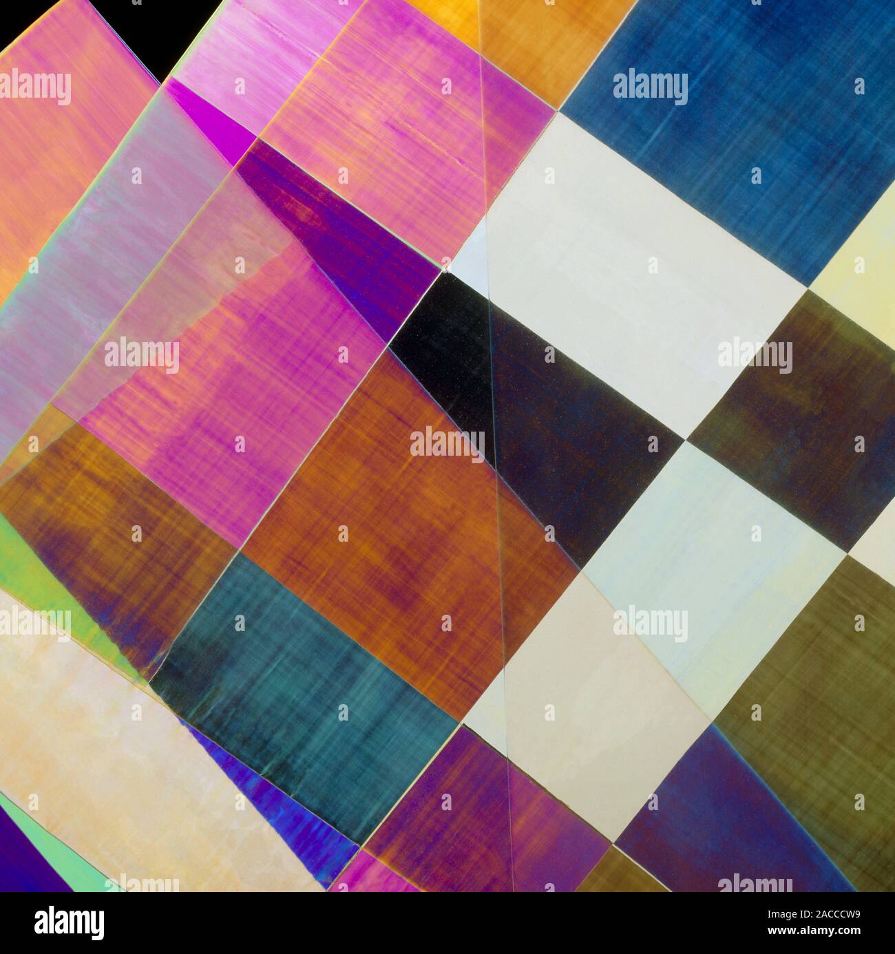 Strips of cellophane photographed under polarised light. Cellophane is ...