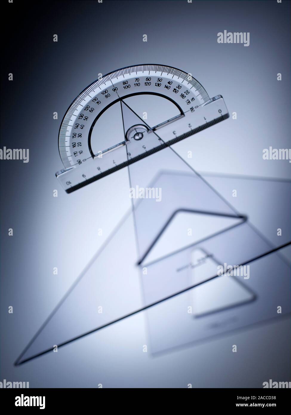Geometry set. Protractor (top), and two set squares. A protractor is ...