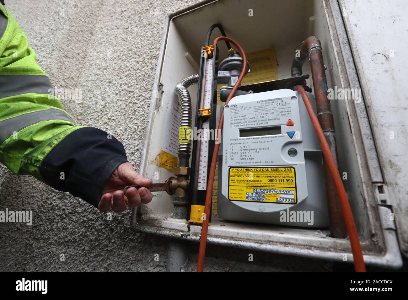 SGN first call operative Martin Beer checks gas pressure on a meter at ...