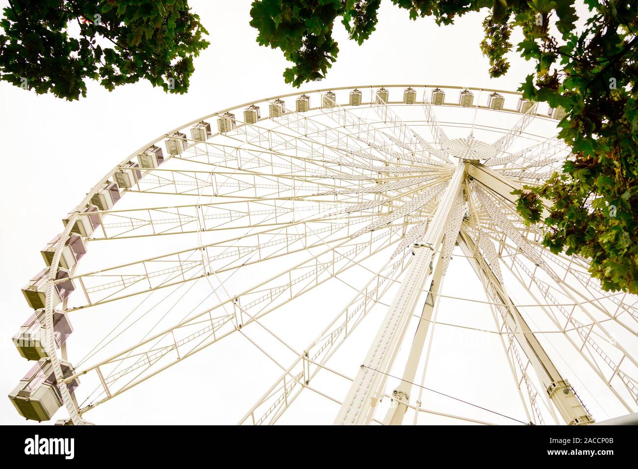 Bottom view on Big russian wheel carousel with cabins Stock Photo - Alamy