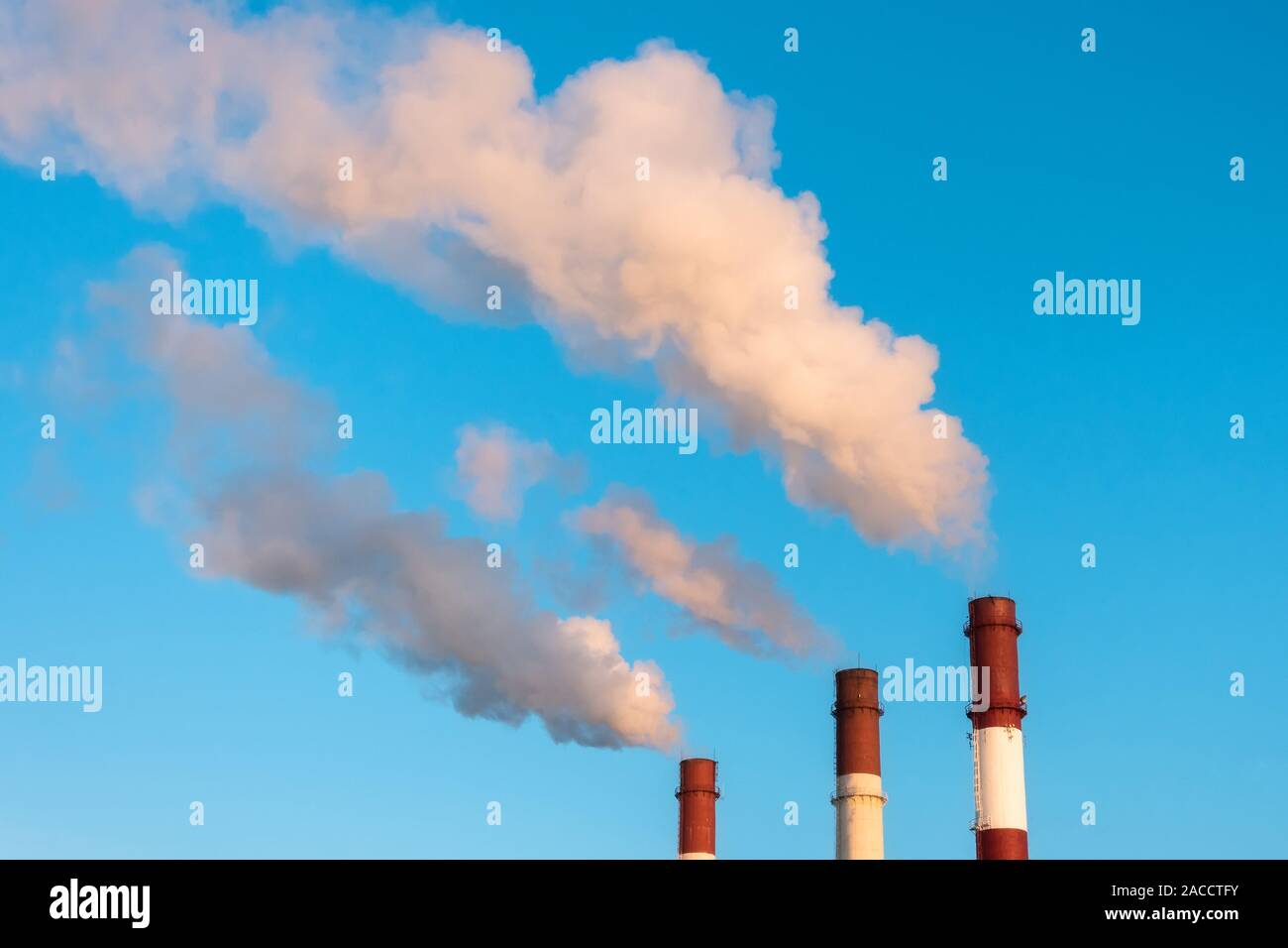 Pipes of a pollution industry throwing pollutant air to the atmosphere ...