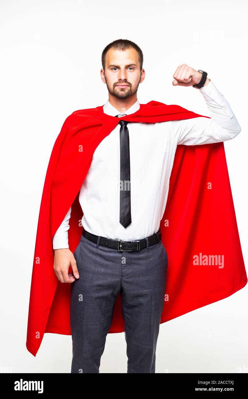 Young businessman in a hero red cape on white background. Business and ...