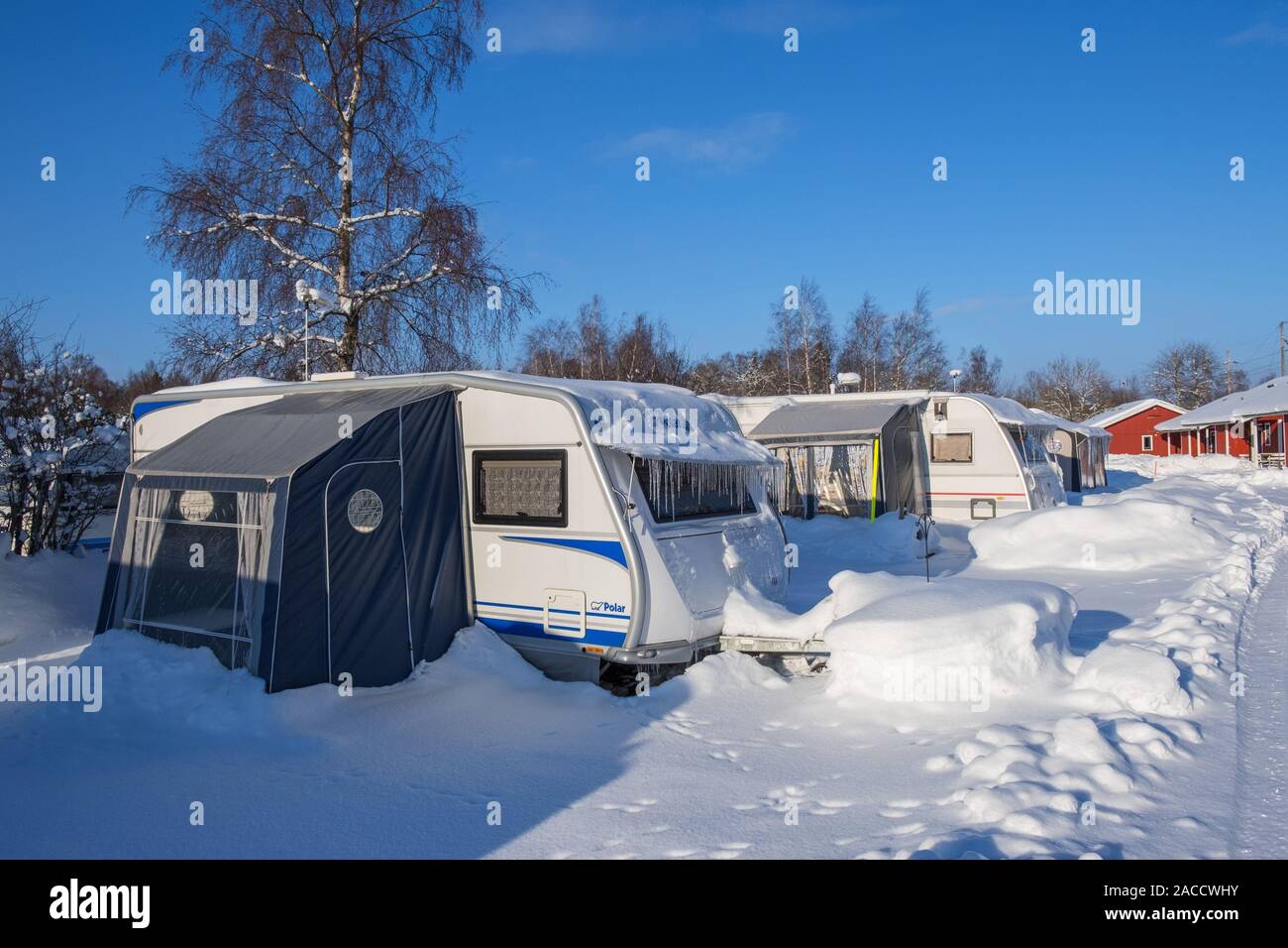 Campsite with snowy and icy caravans in winter Stock Photo - Alamy