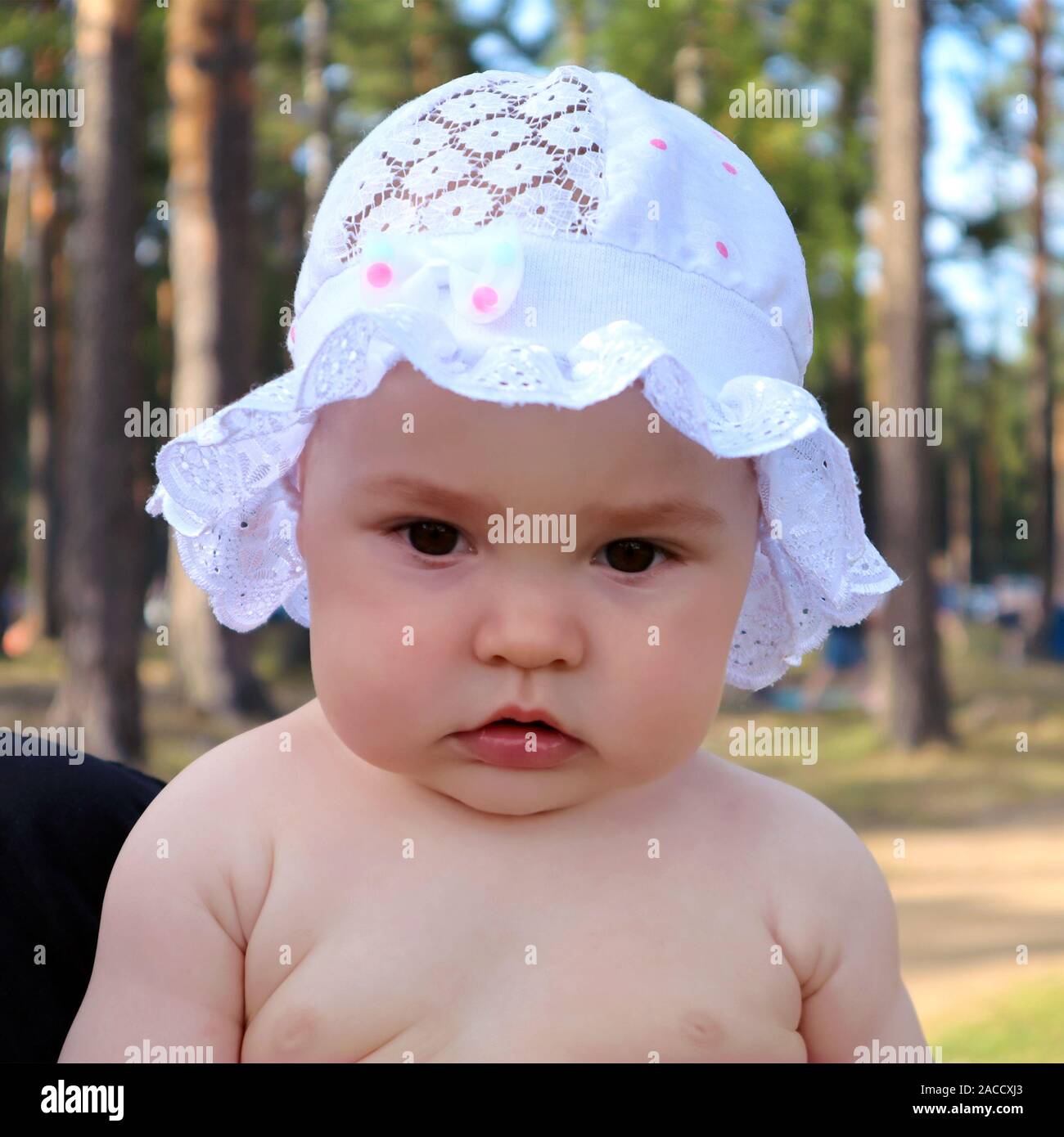 Little girl in cap hi-res stock photography and images - Alamy