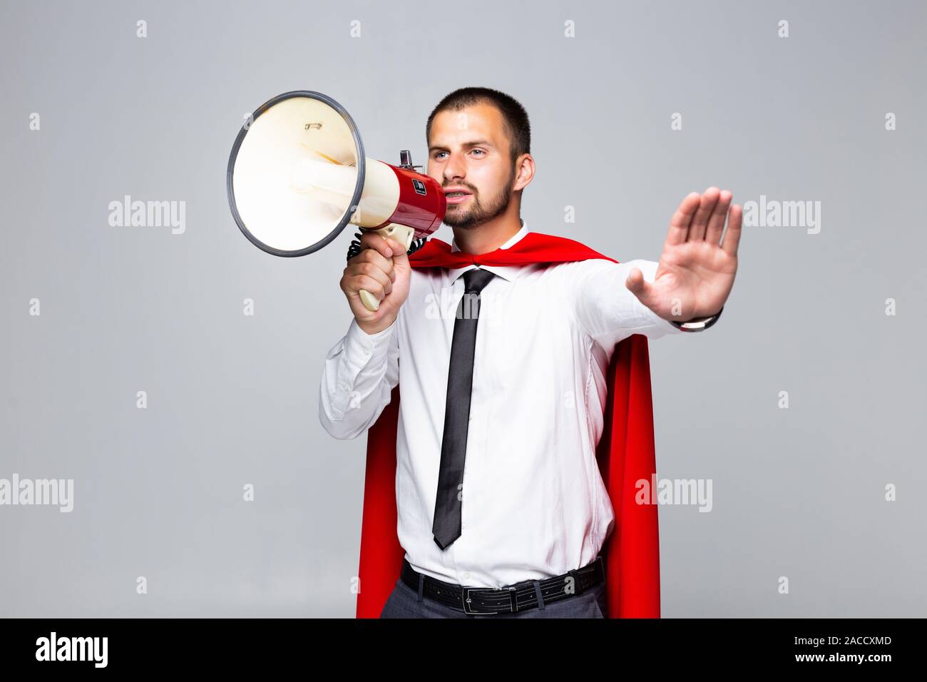 Man cape megaphone hi-res stock photography and images - Alamy