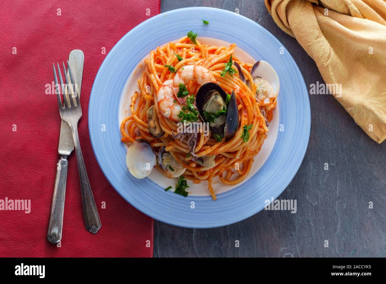 Italian seafood pasta pescatore with mussels clams shrimp and squid ...