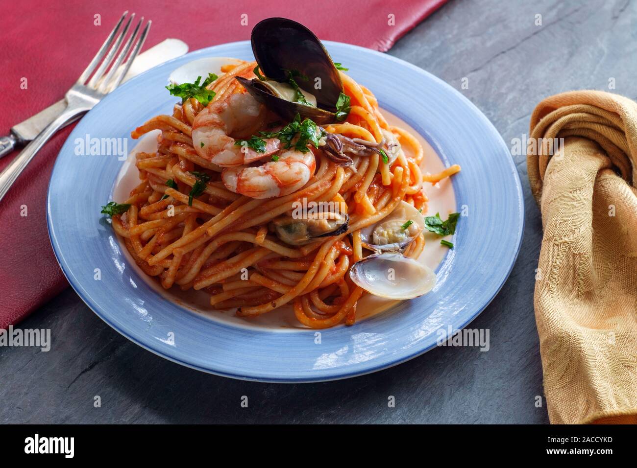 Italian seafood pasta pescatore with mussels clams shrimp and squid ...