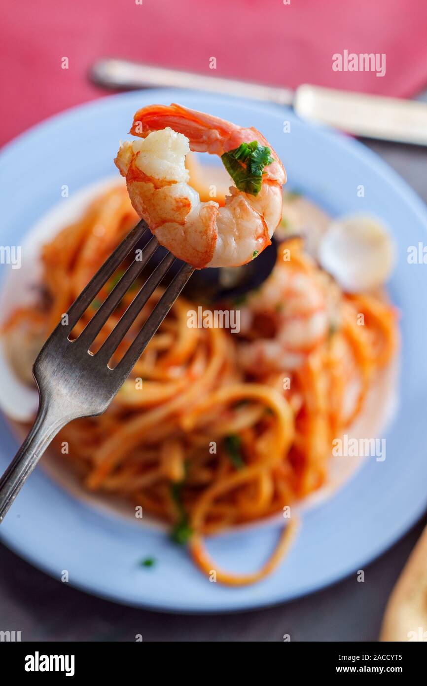 Italian seafood pasta pescatore with mussels clams shrimp and squid ...