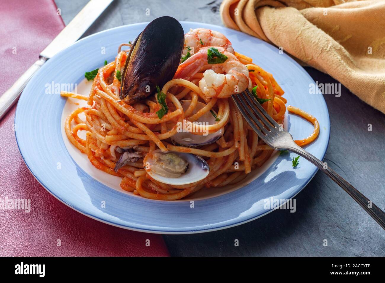 Italian seafood pasta pescatore with mussels clams shrimp and squid ...