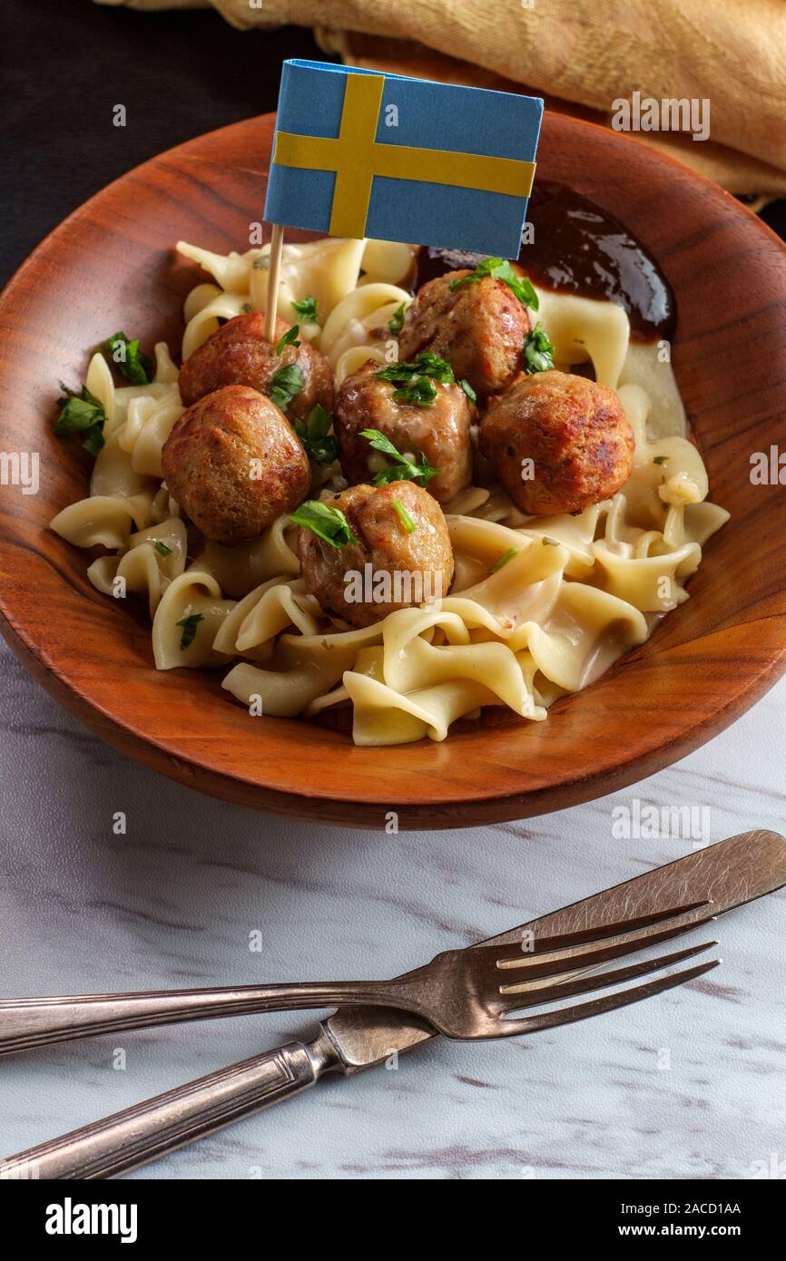 Swedish meatballs with mini flag toothpick noodles gravy and jelly in ...